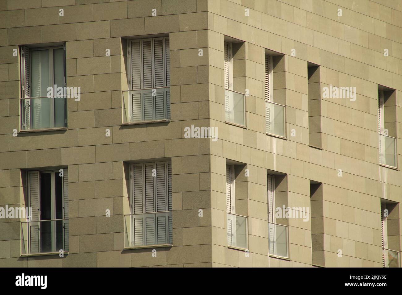 A picture from the corner side of a white building in Bilbao, Spain ...