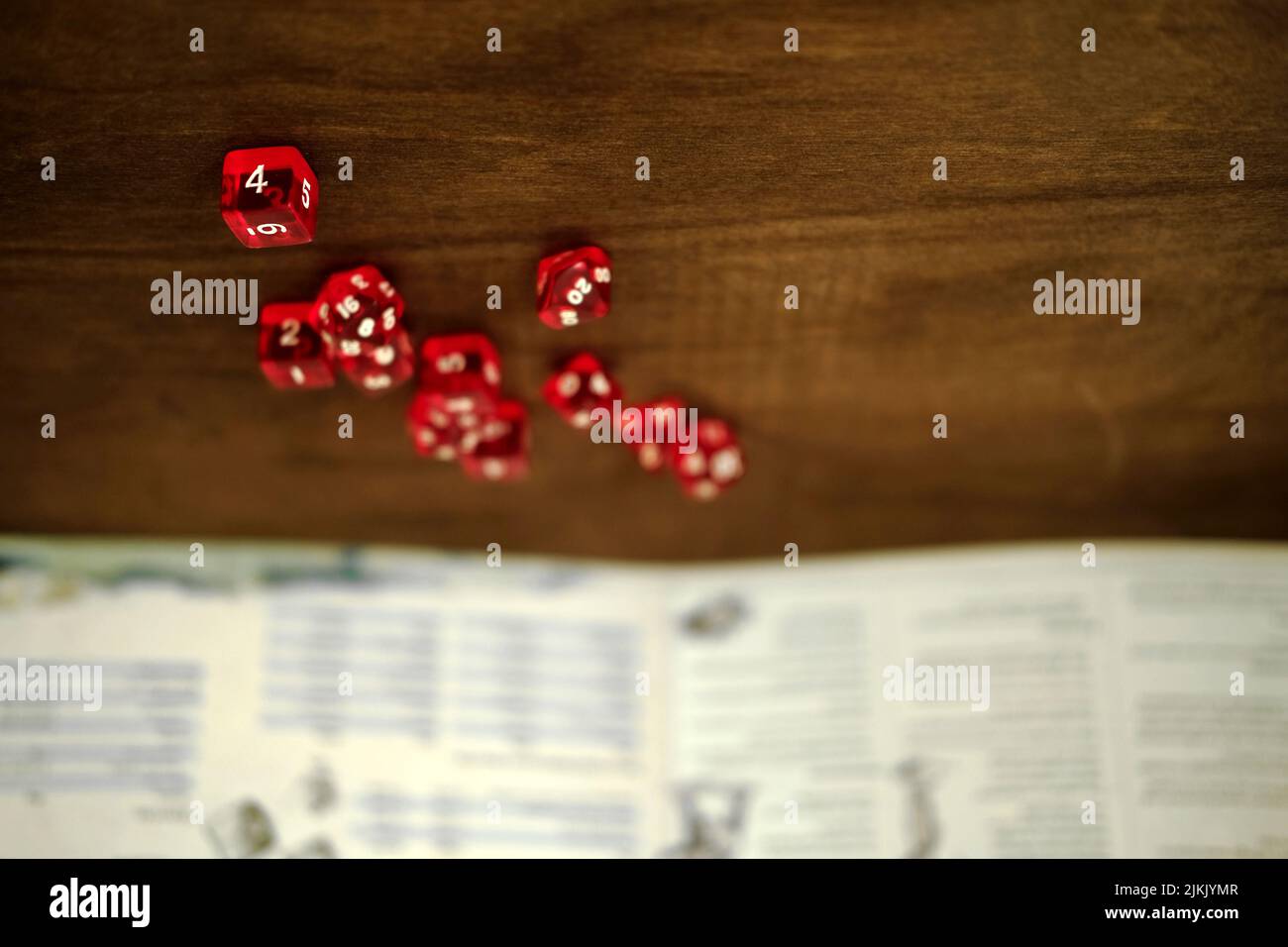 Red dice for roleplay game Stock Photo - Alamy