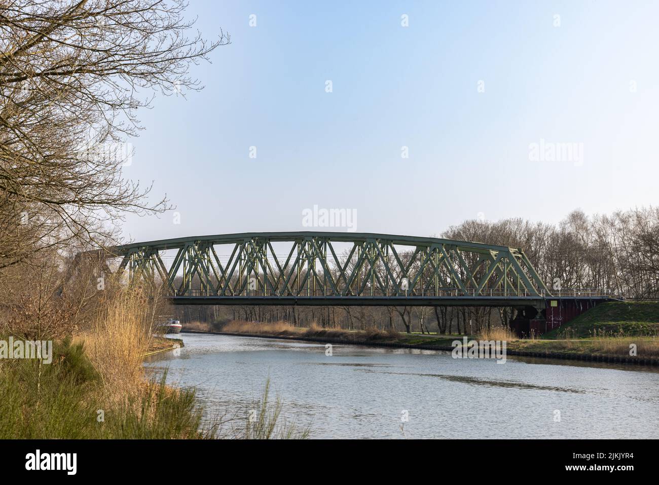 A train bridge over a river in the Netherlands going over the ...