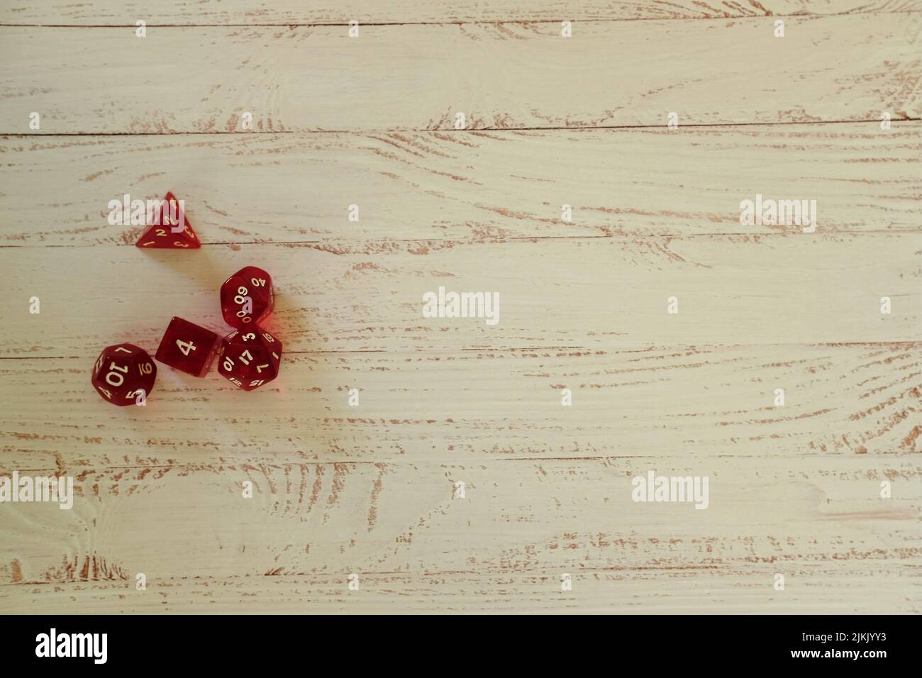 Red dice for roleplay game Stock Photo - Alamy