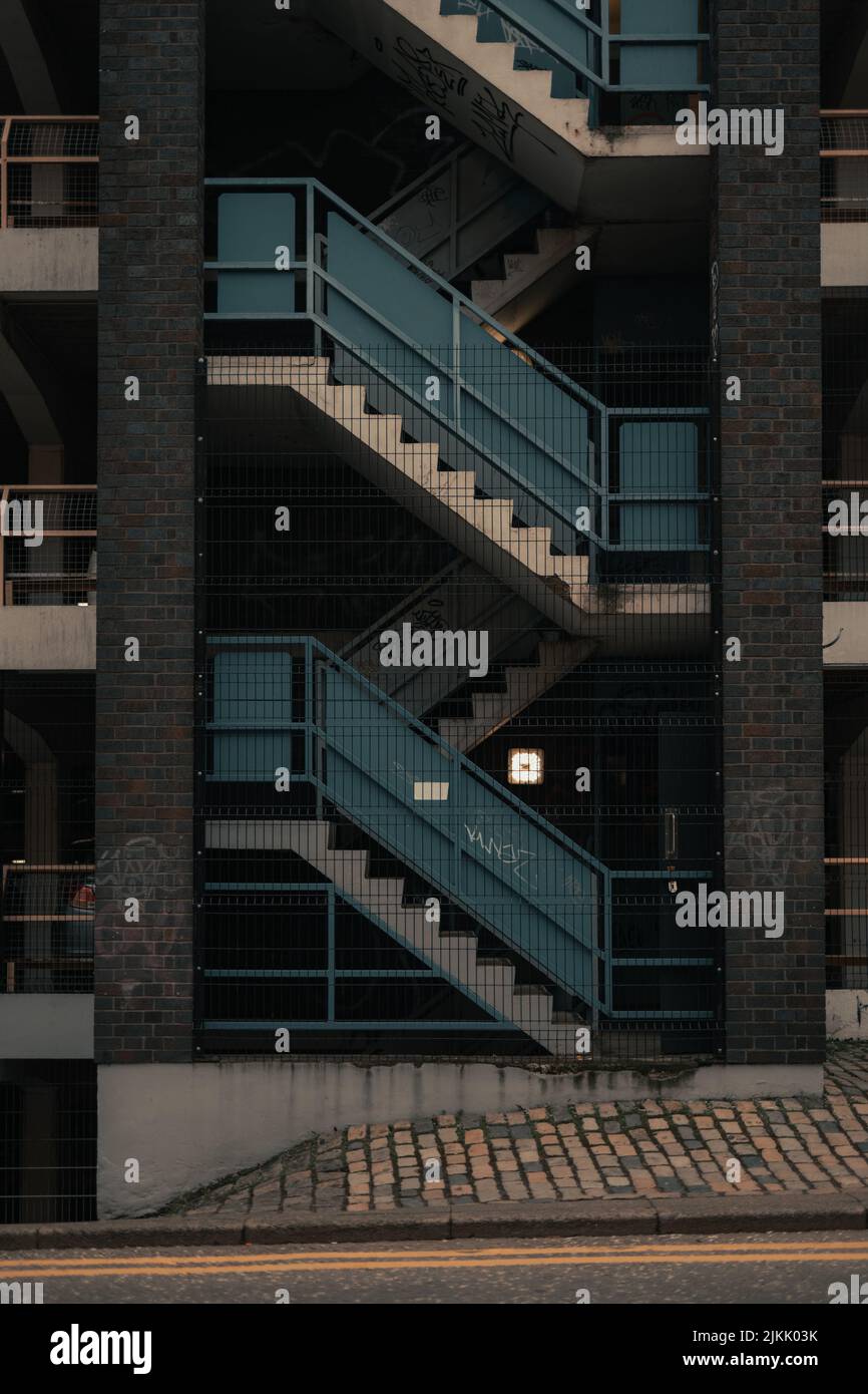 A vertical photo of exterior stairs of a building Stock Photo - Alamy