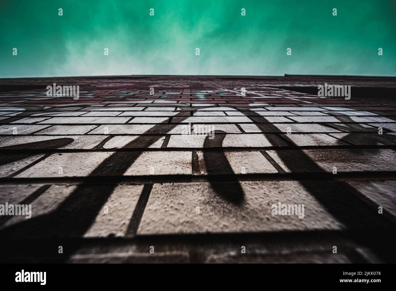 A low angle shot of a street art graffiti around the London Town under ...