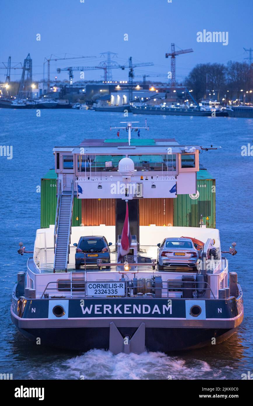 A vertical shot of the Cornelis-R container ship going towards the city ...