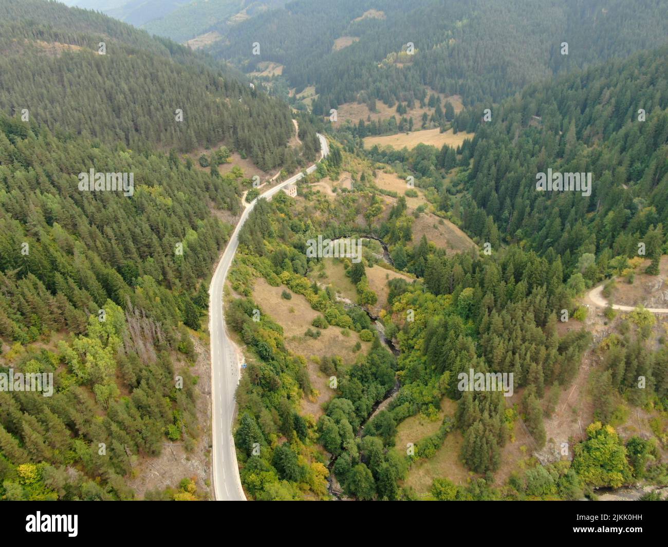 An aerial view of forest fields and countryside in Asenovgrad, Bulgaria ...