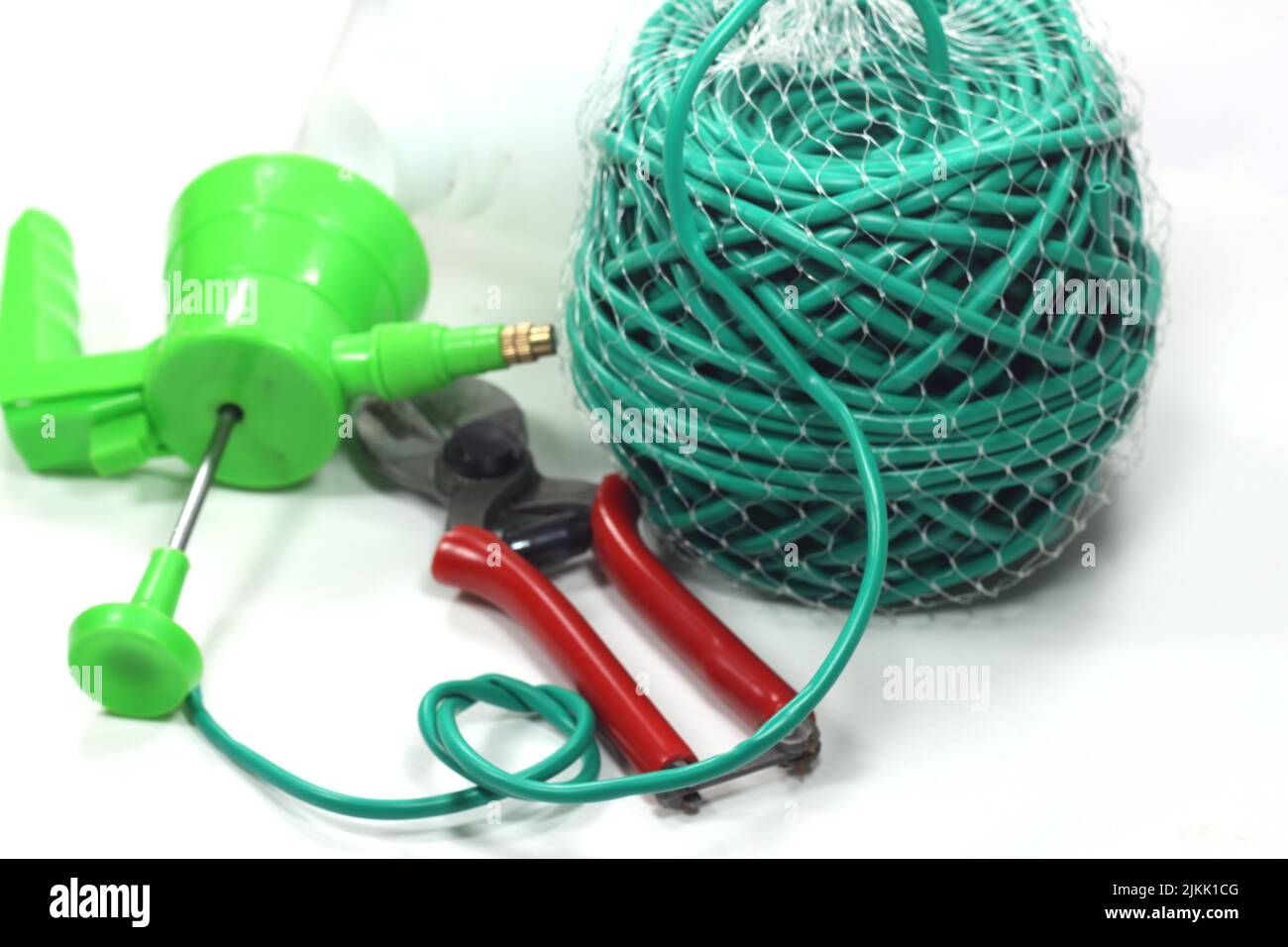 leather work gloves, plasticized rope and agricultural scissors Stock ...