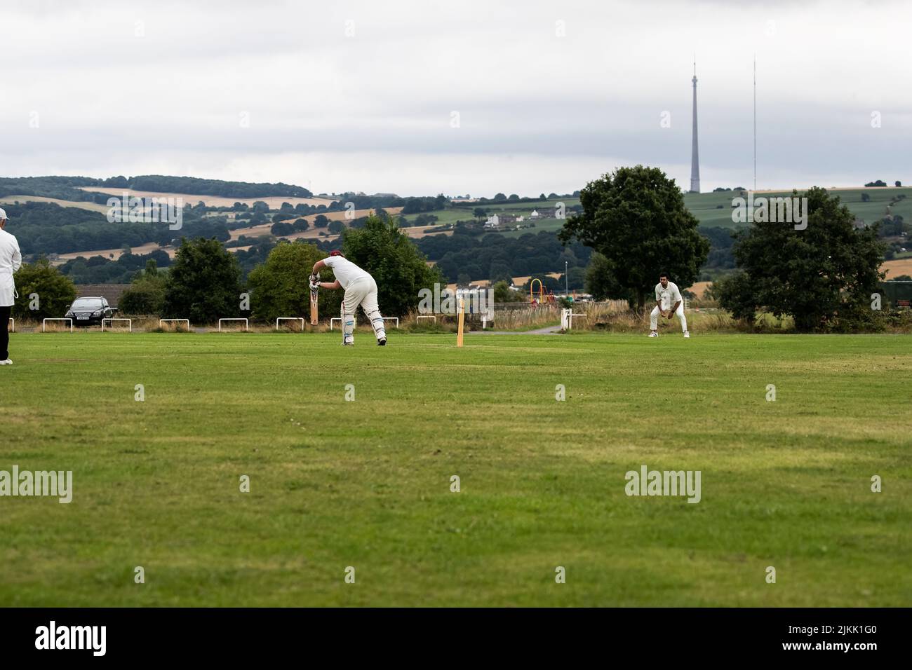 Batsman playing a forward defensive shot at a local village cricket ...