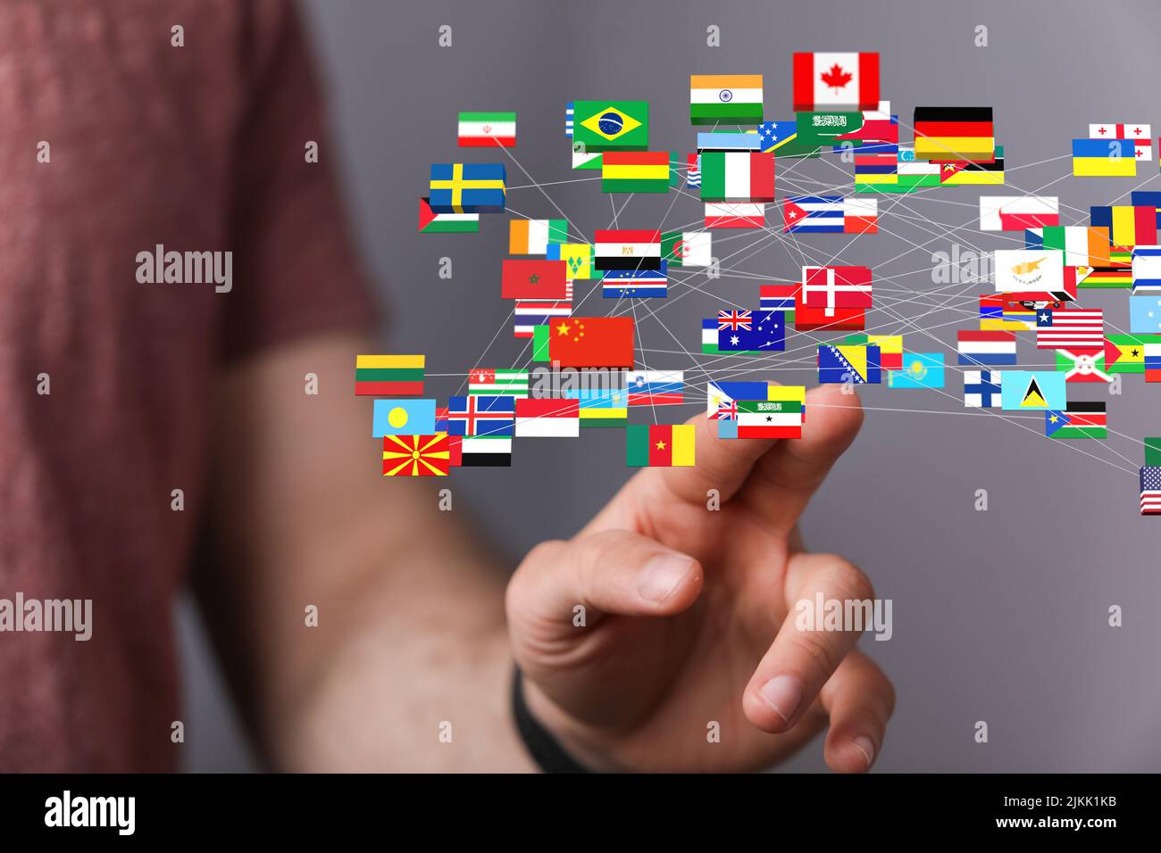 A businessman on a blurry background touching 3D rendering national ...