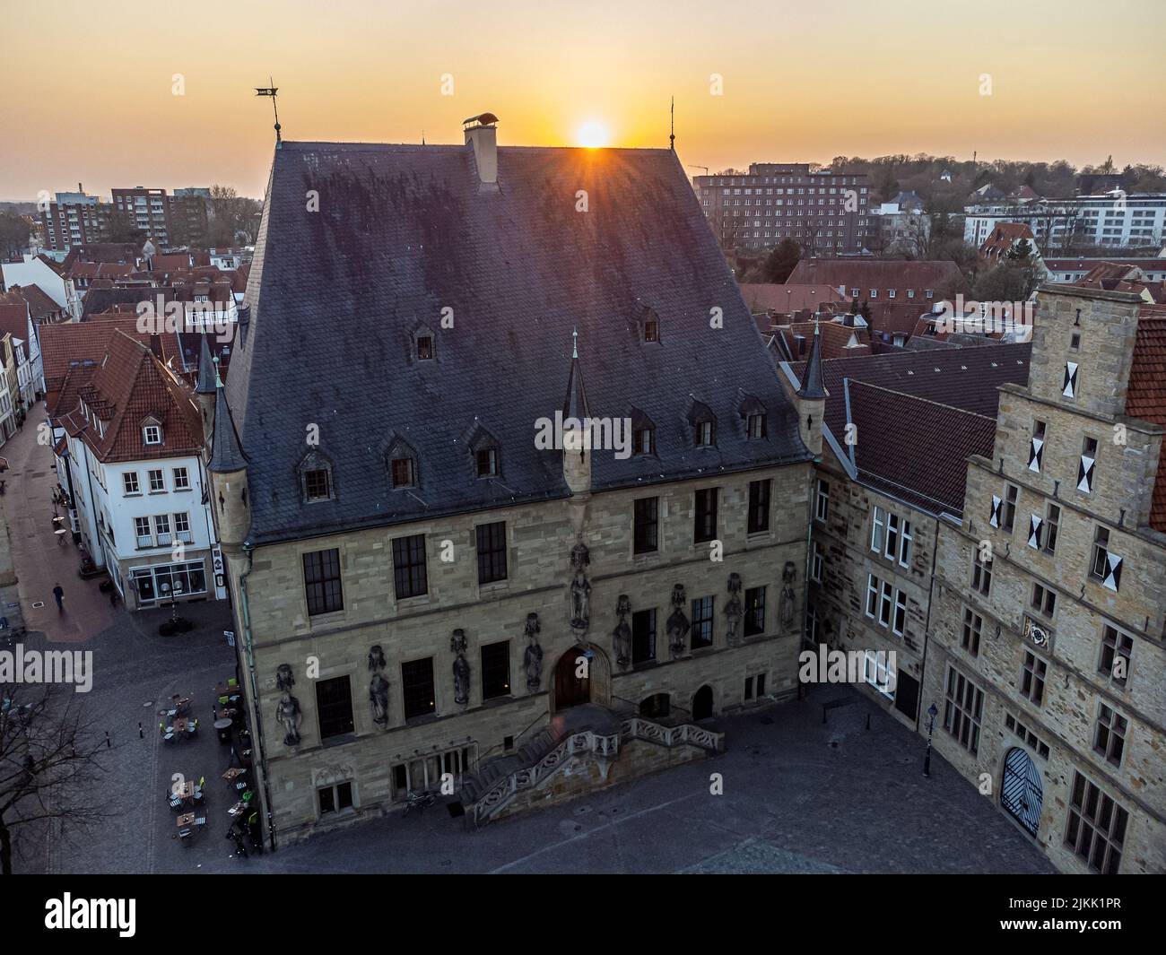 An aerial shot of a typical European square surrounded by aged ...