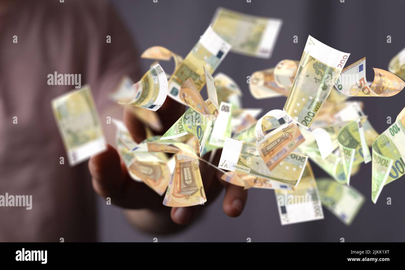 A person presenting the virtual projection of falling dollar bills ...