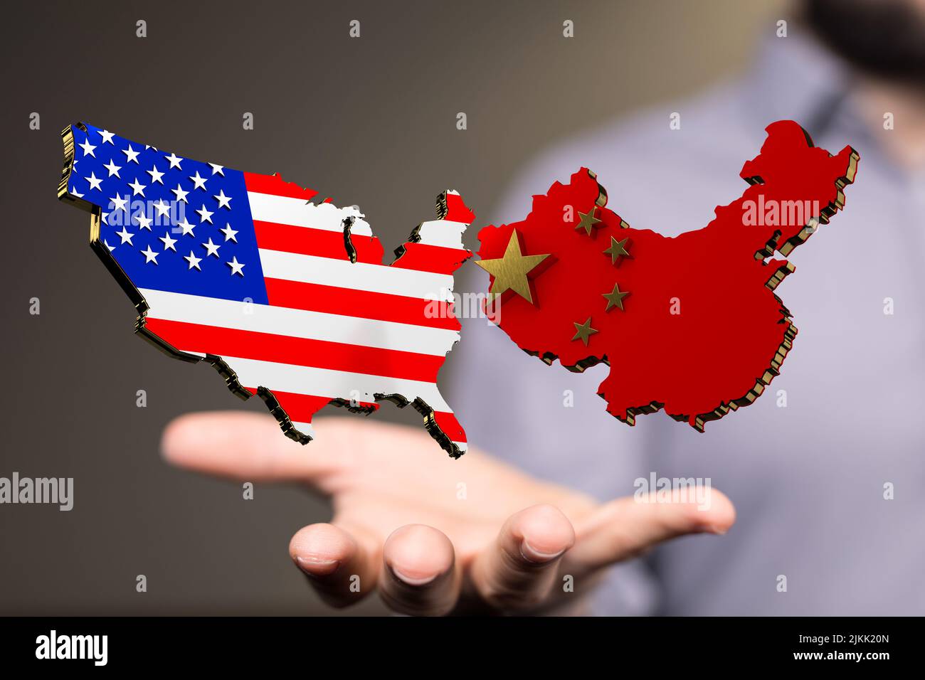A person presenting the virtual projection of the maps of USA and China ...