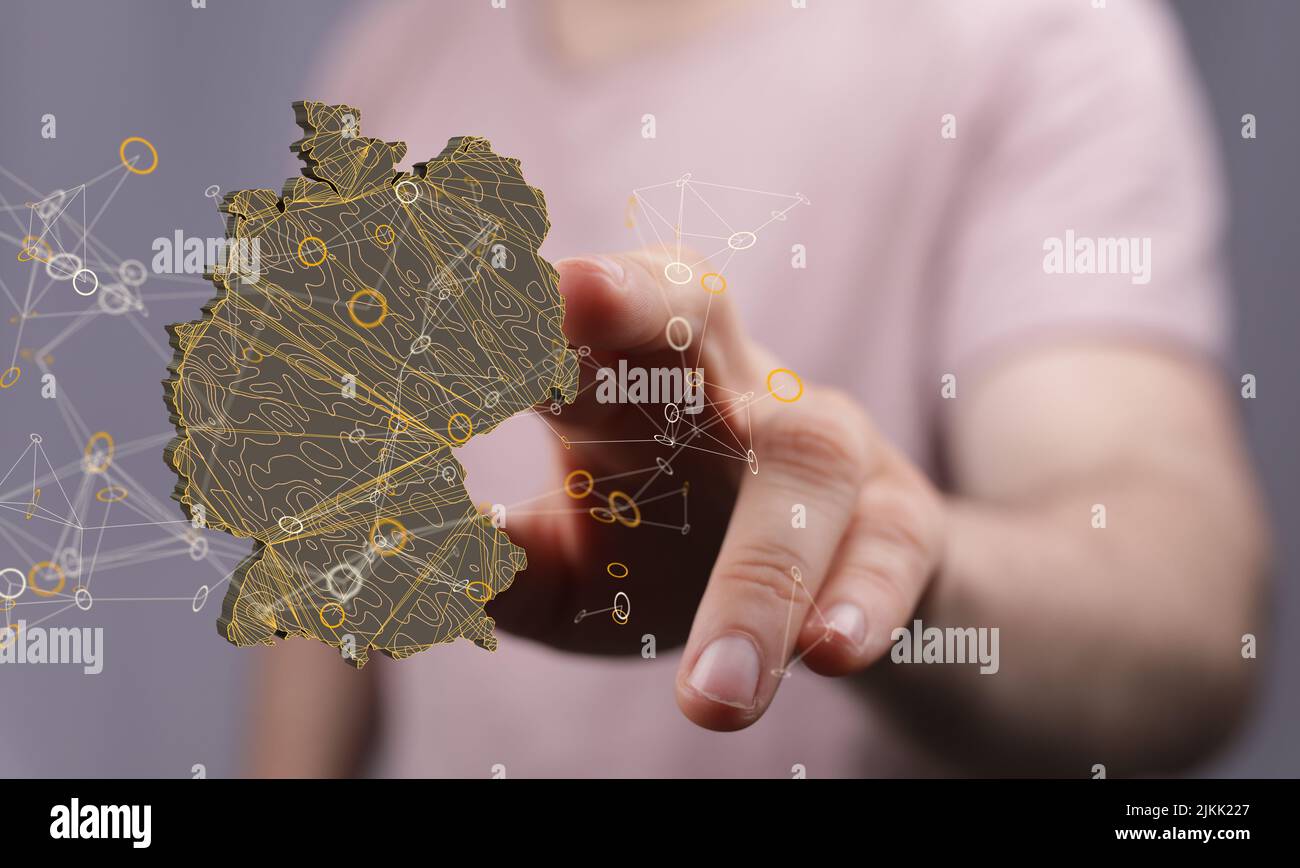 A person presenting the virtual projection of the germany map and ...