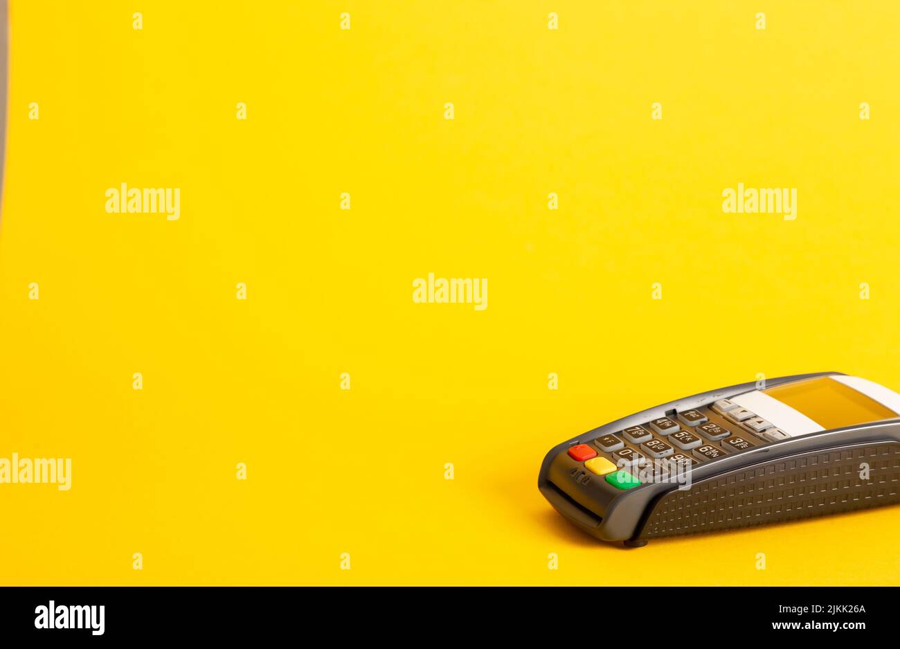 A closeup of an electronic payment terminal isolated on the right side ...