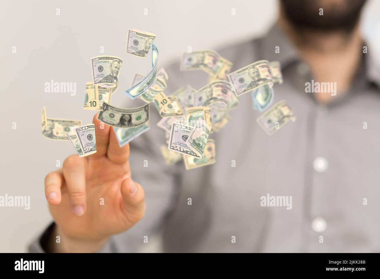 A person presenting 3D rendered falling banknotes Stock Photo - Alamy
