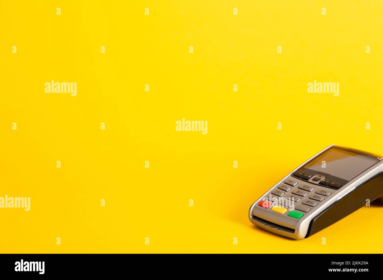 A closeup of an electronic payment terminal isolated on the right side ...