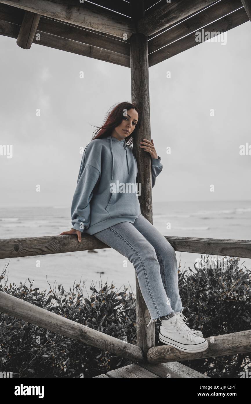 Sitting on handrail hi-res stock photography and images - Alamy