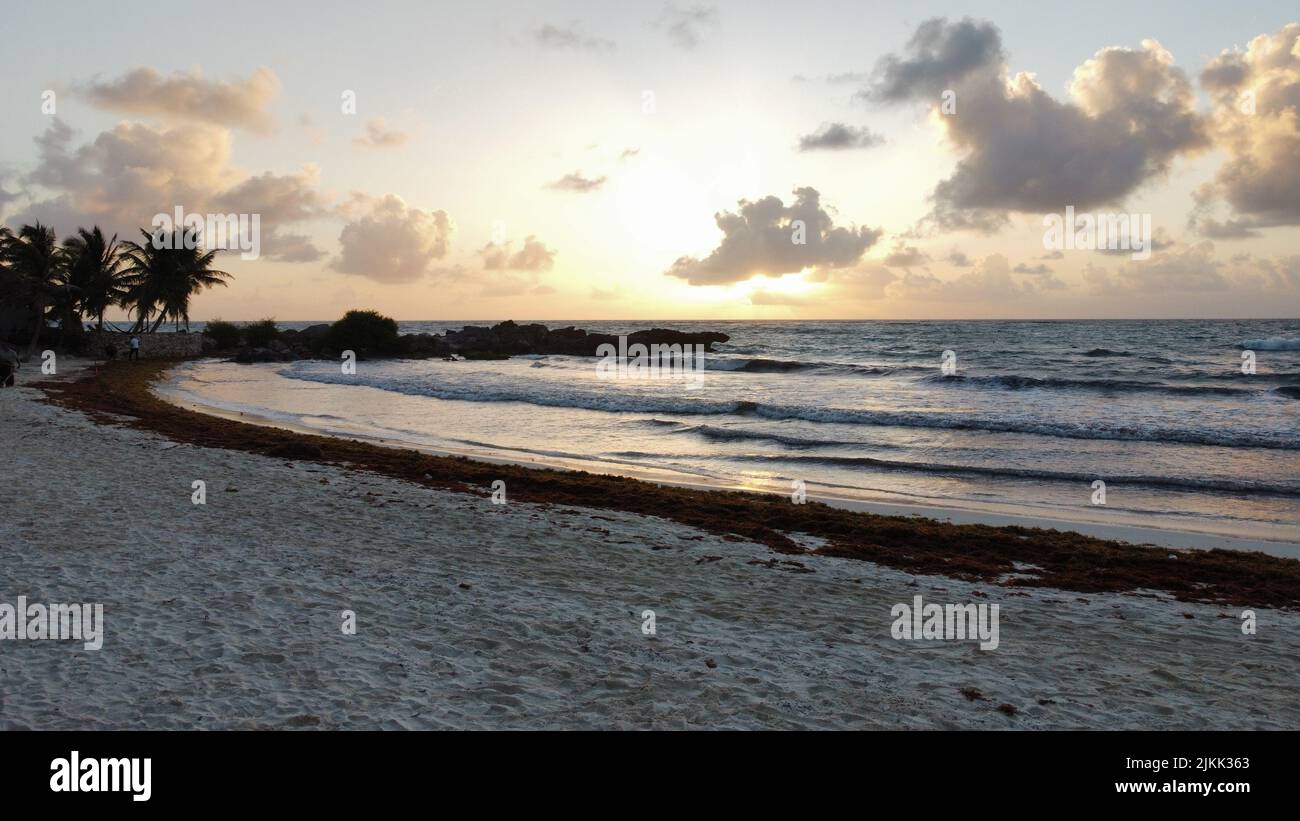 The breathtaking sunset on Tulum Beach Mexico Caribe Cancun Stock Photo ...