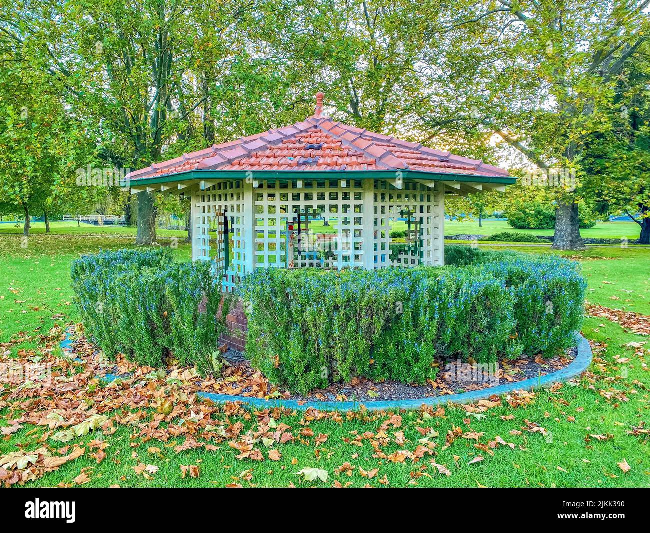 A wooden gazebo surrounded by plants in a park of Glen Innes, Australia ...