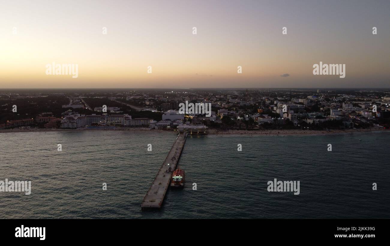 An aerial view of the bridge over sea with cityscape on Tulum Beach ...