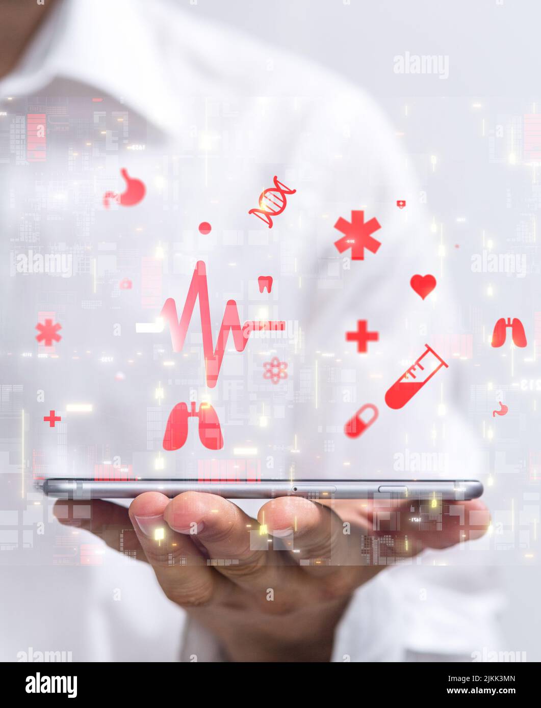 A photo of UI medical icons in hospital with a hand holding a mobile as ...