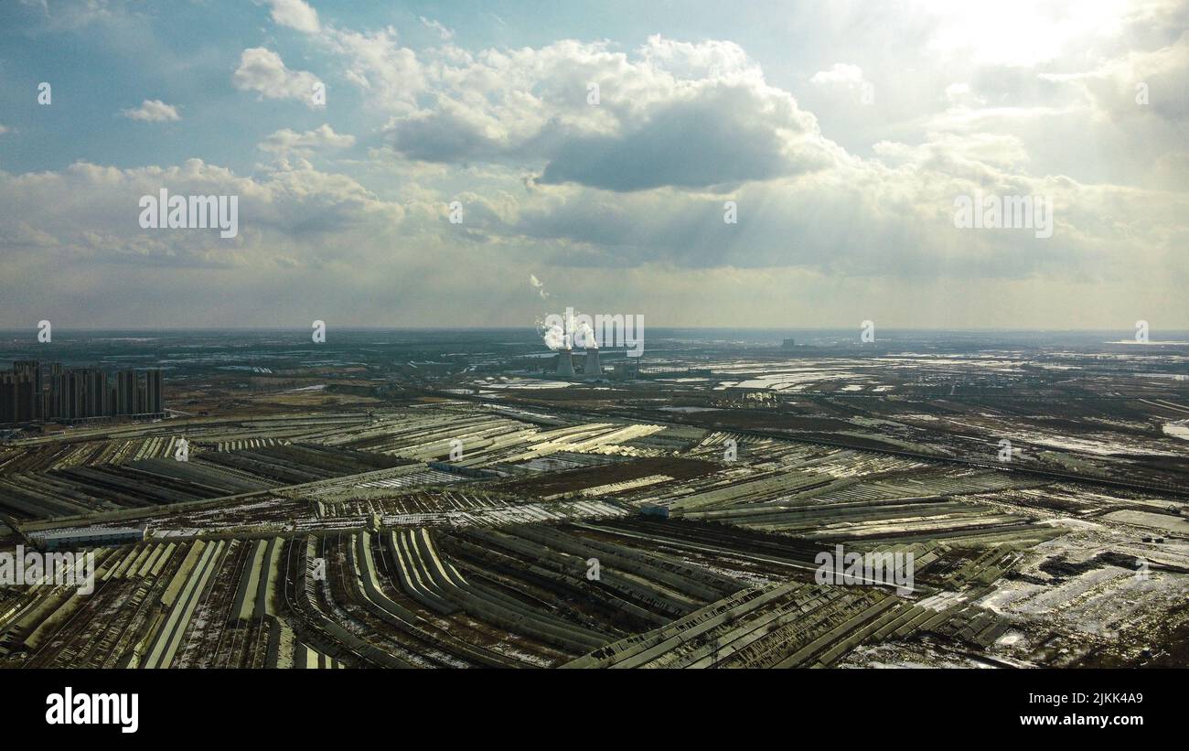 An aerial view of a winter landscape with buildings in Harbin, China ...