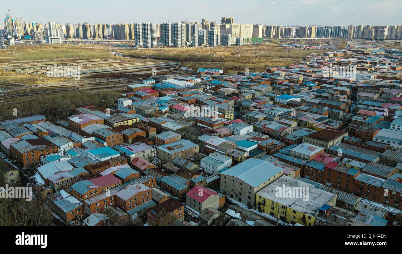 An aerial view of a cityscape with many buildings in Harbin, China ...