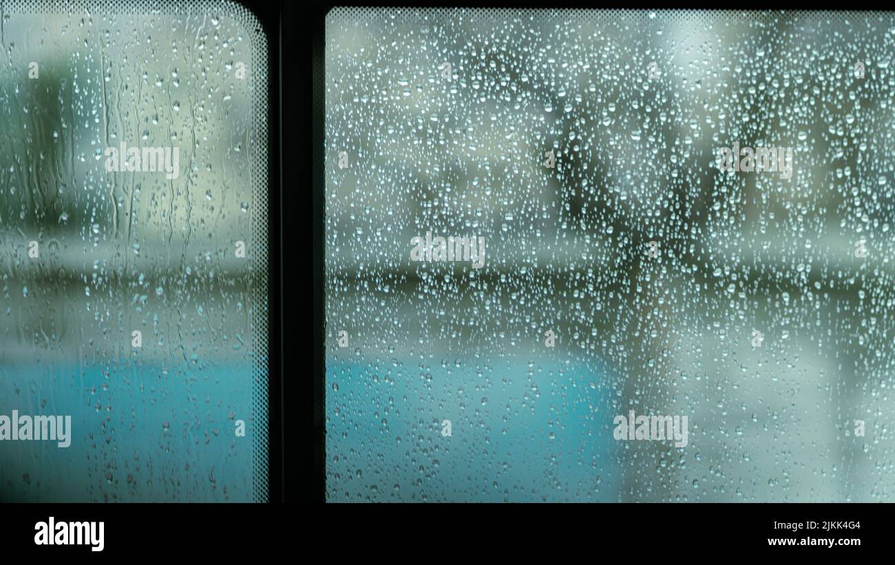 A wet window on a rainy day Stock Photo - Alamy