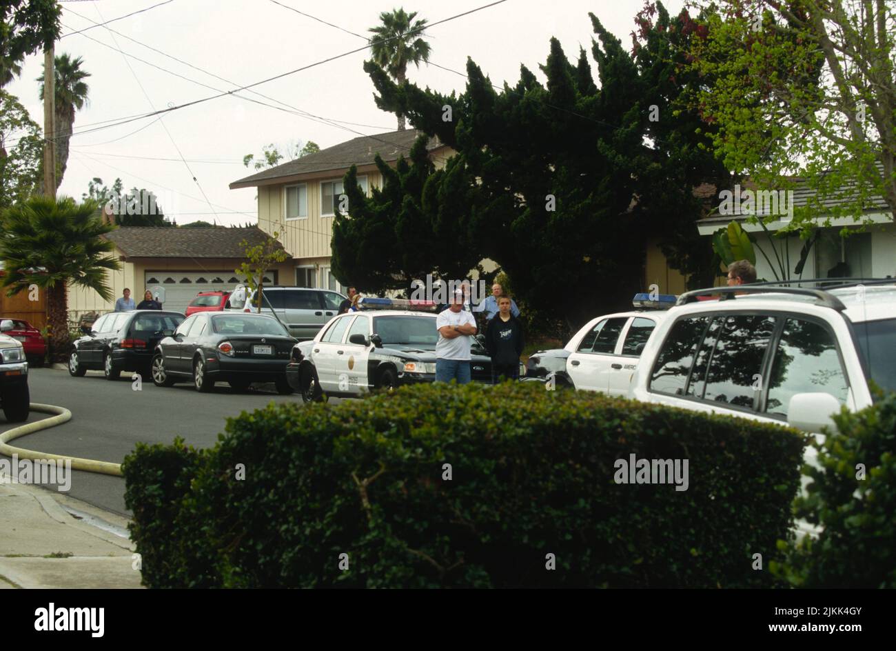 San Diego residents watching San Diego City Firefighters working a ...