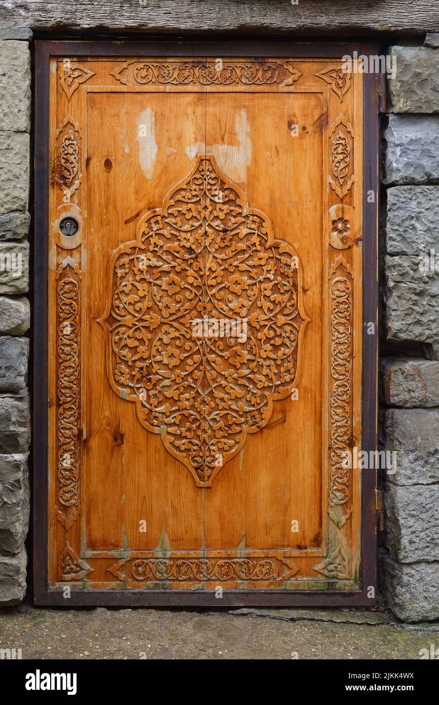 Carved ancient door of the ancient watchtower "Akayla kalya" or Kubachi ...