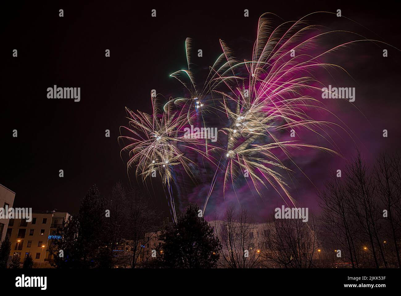 A beautiful fireworks display in the dark night sky of Riga, Latvia ...