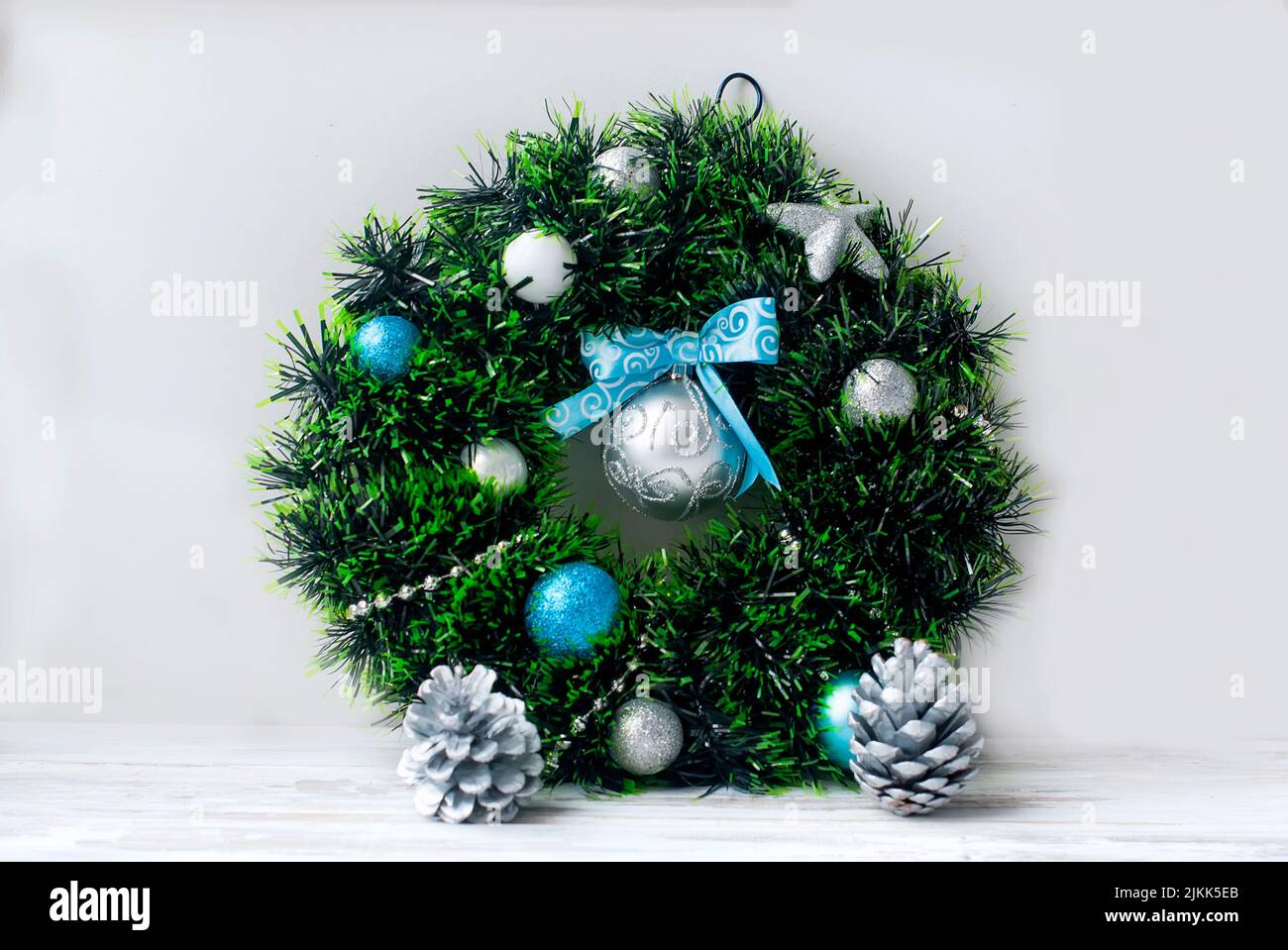 Christmas decoration wreath with blue and silver boll, toys and ribbon ...