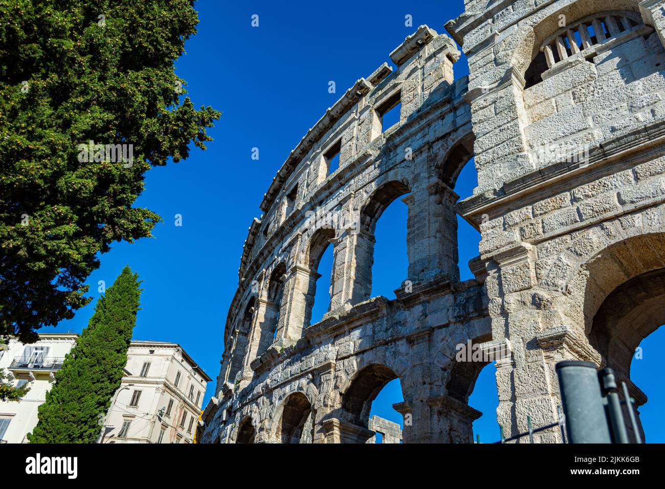 A low angle shot of the beautiful architecture of Pula Arena in Croatia ...