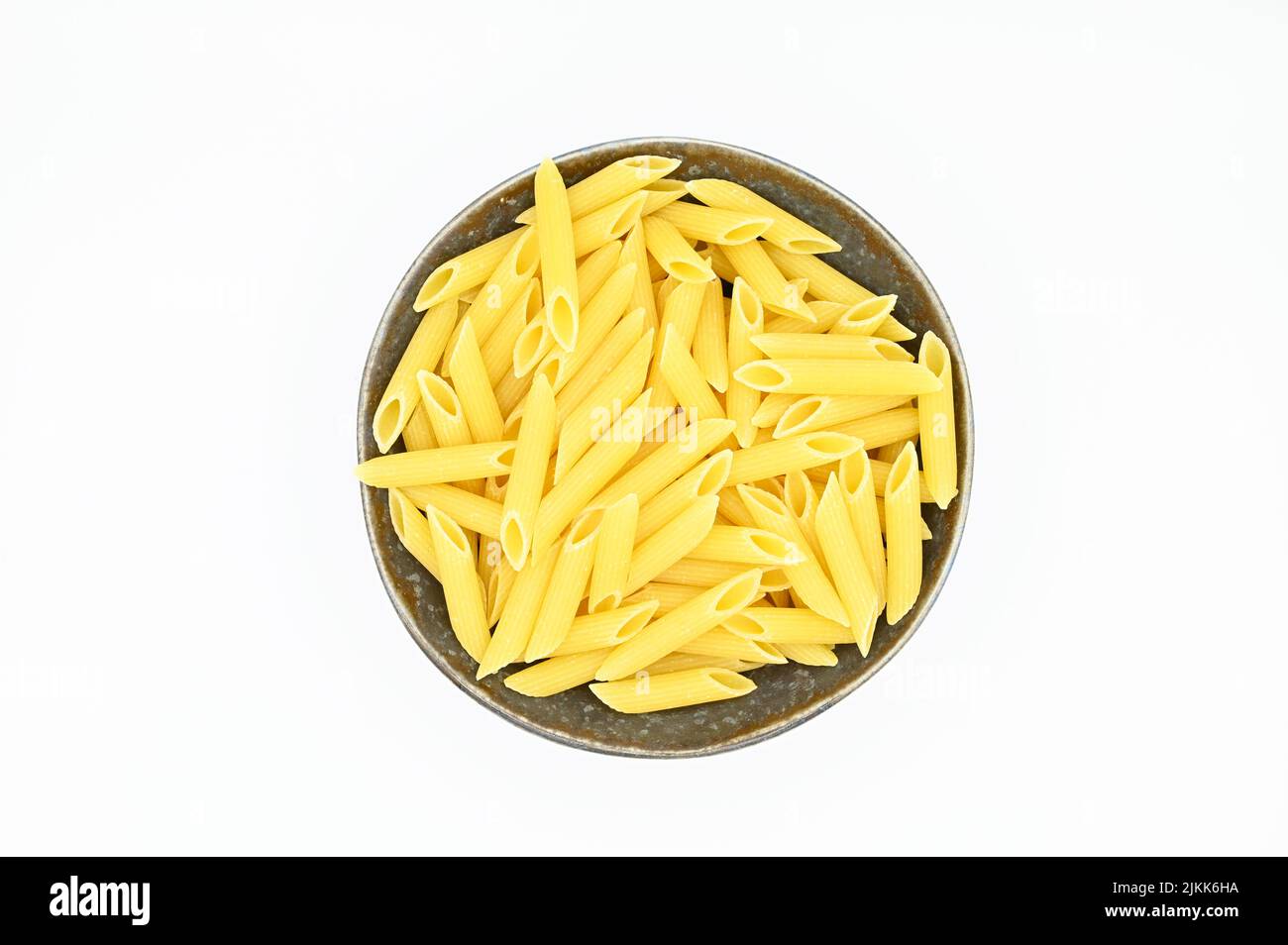 Raw penne pasta Cut Out Stock Images & Pictures - Alamy