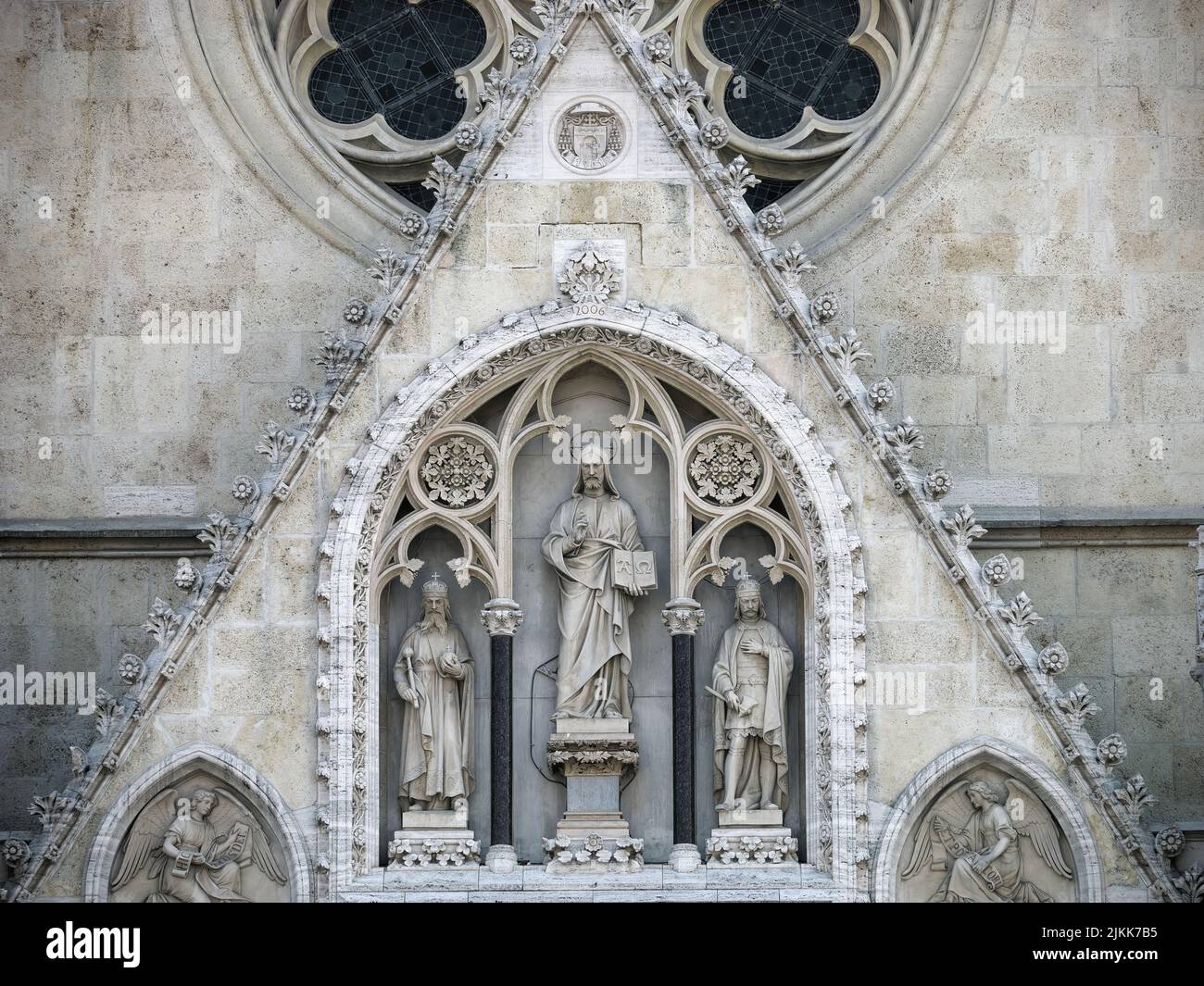 A gable triangle with a statue of Christ above the main entrance of the ...
