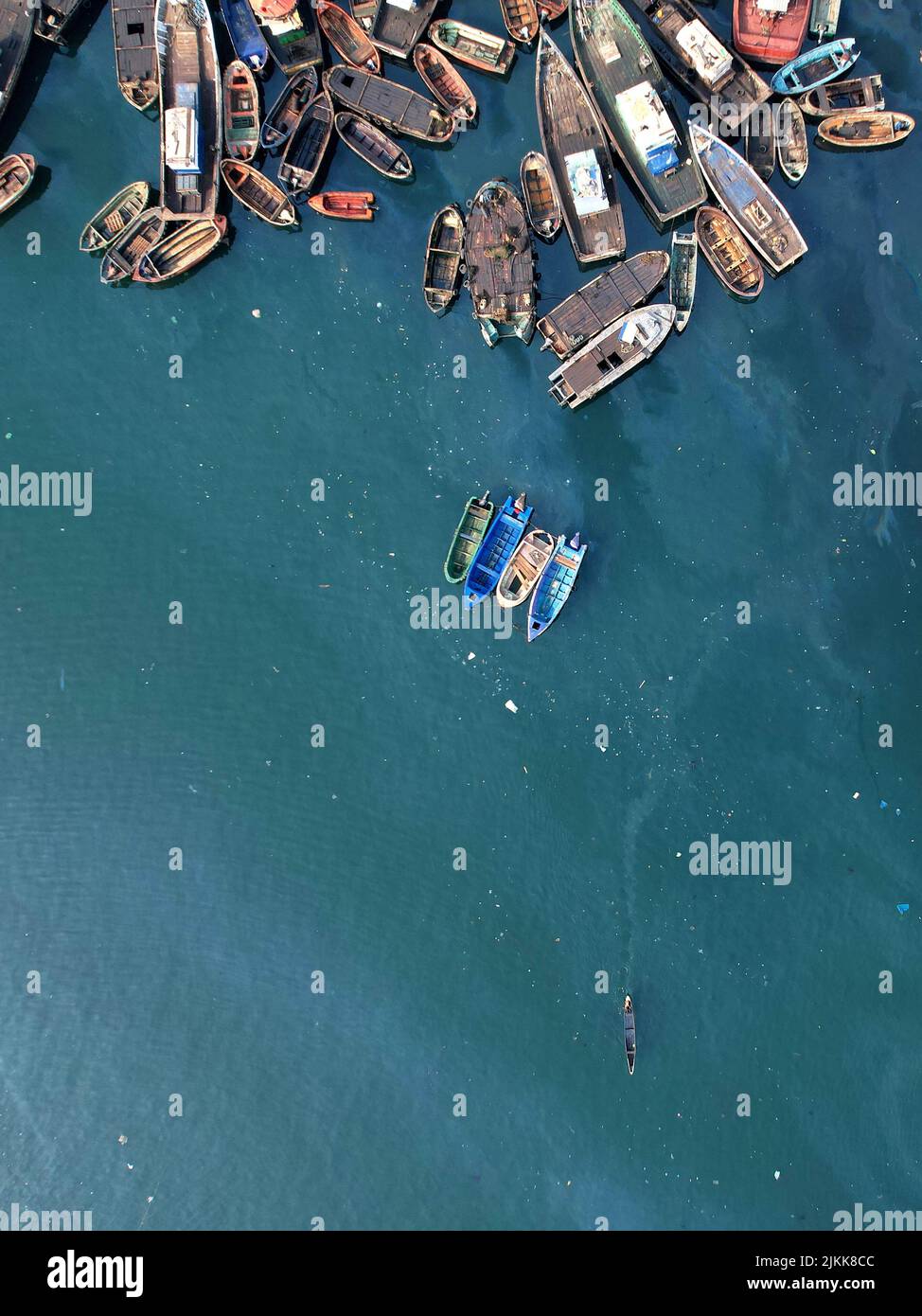A top view of many different-sized small boats in the sea Stock Photo ...