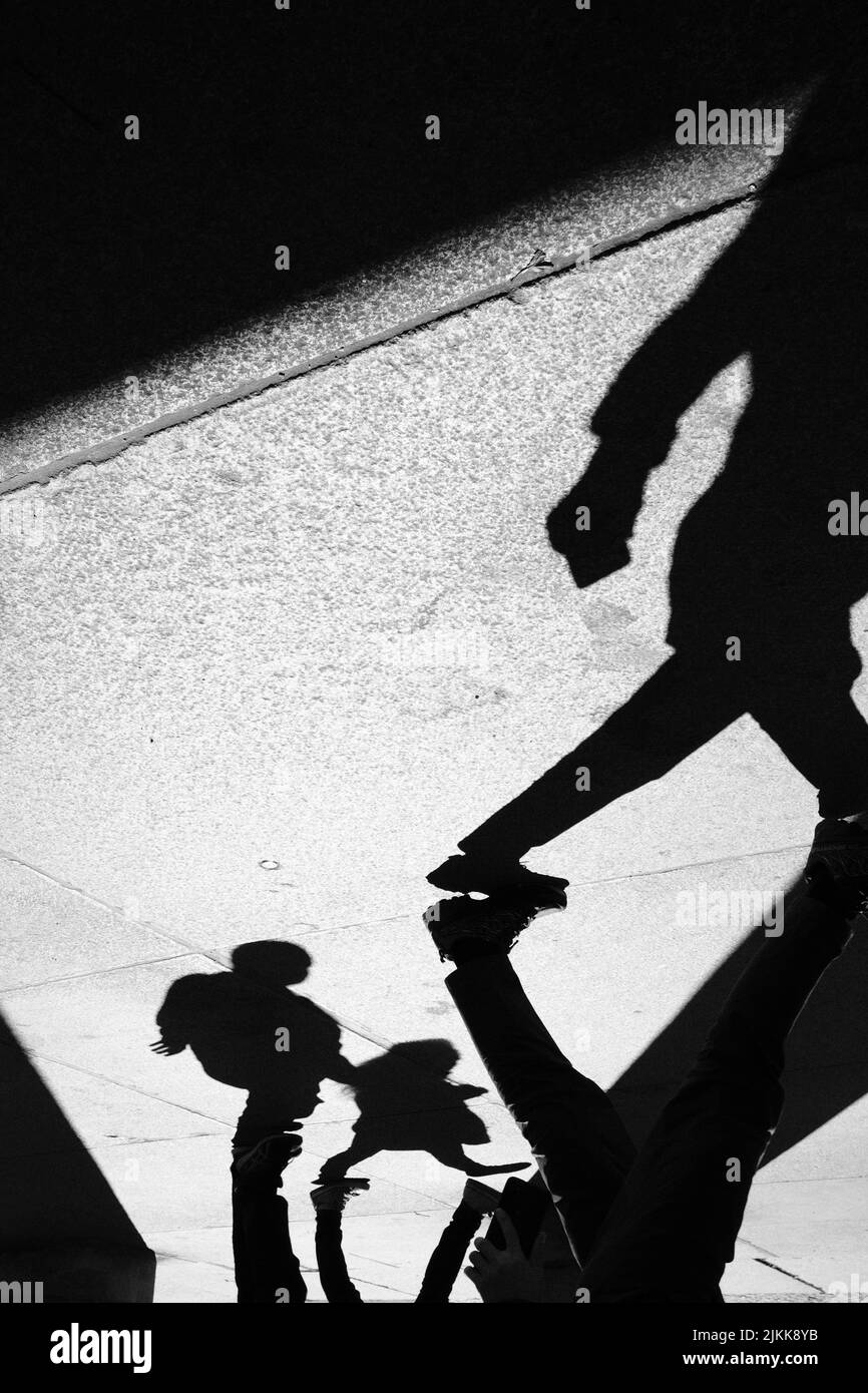 Shadow of walking people hi-res stock photography and images - Alamy Shadow of walking people hi-res stock photography and images - Alamy