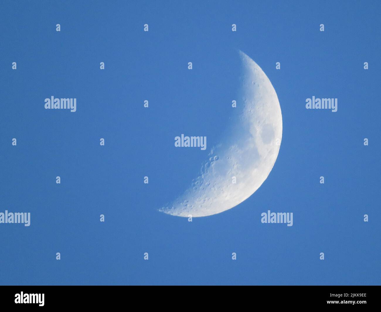 A close-up view of the first quarter moon in the daytime Stock Photo ...