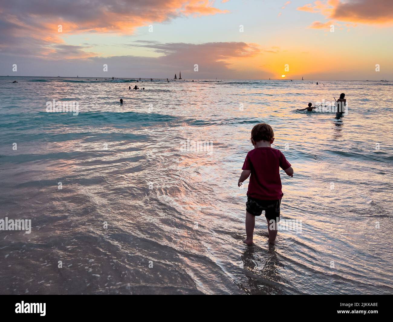 Child playing at the sea hi-res stock photography and images - Alamy