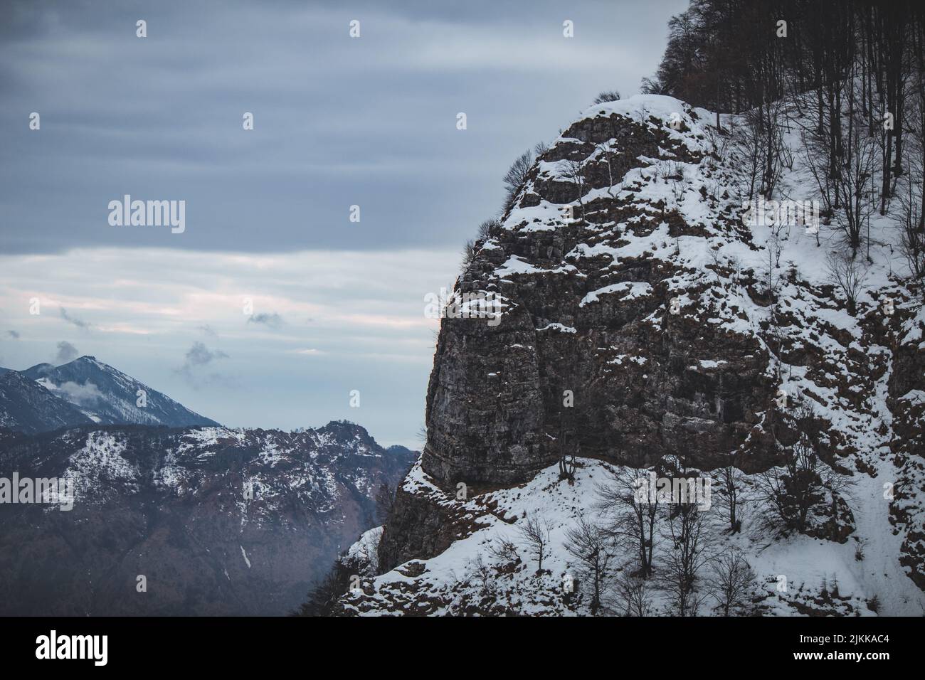 An aerial view of snow-covered mountain peaks in Piani dei Resinelli ...