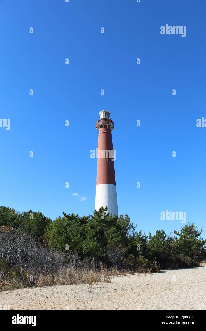 Lighthouse sailboat view ocean hi-res stock photography and images - Alamy