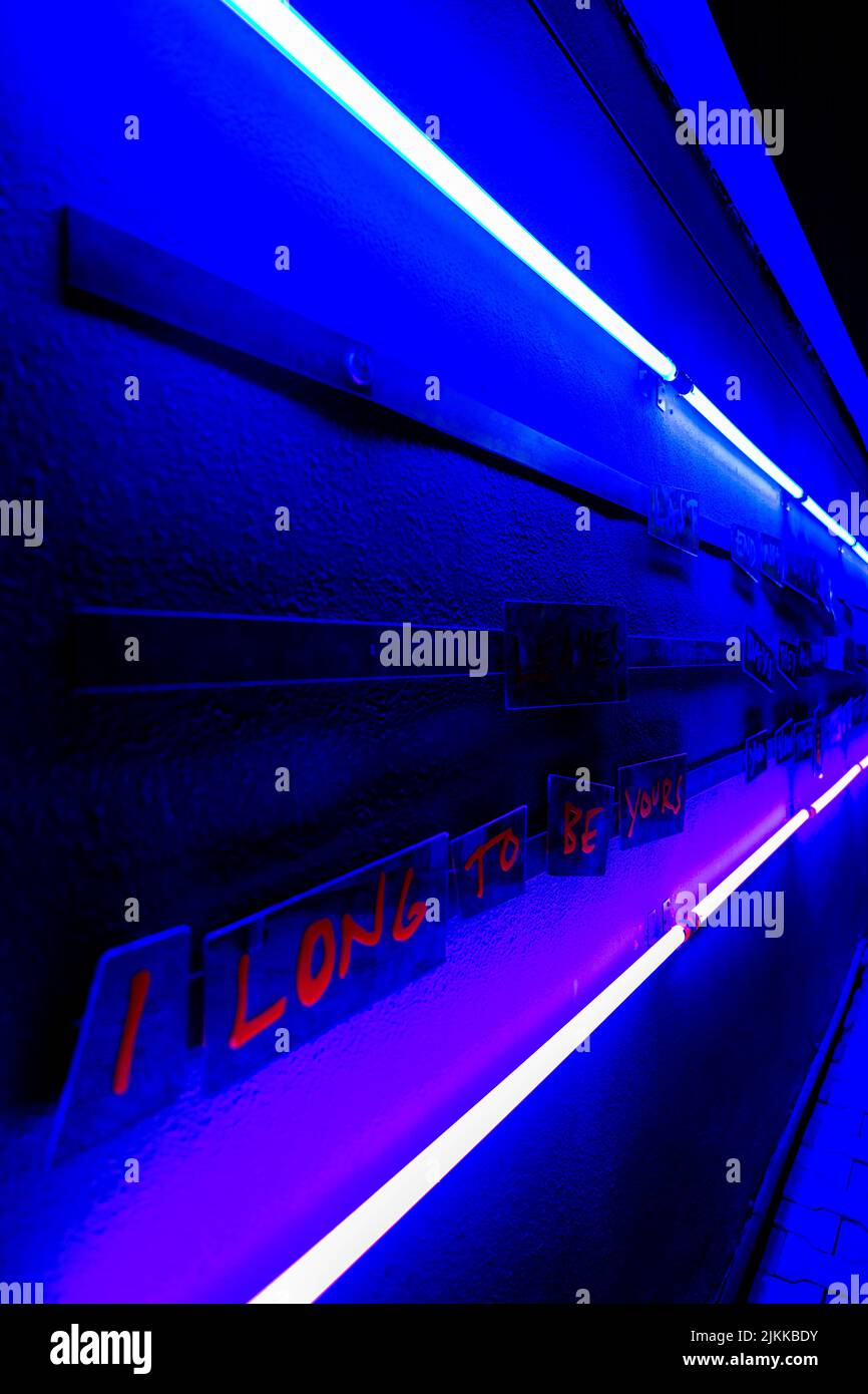 The neon blue lights with text background Stock Photo - Alamy