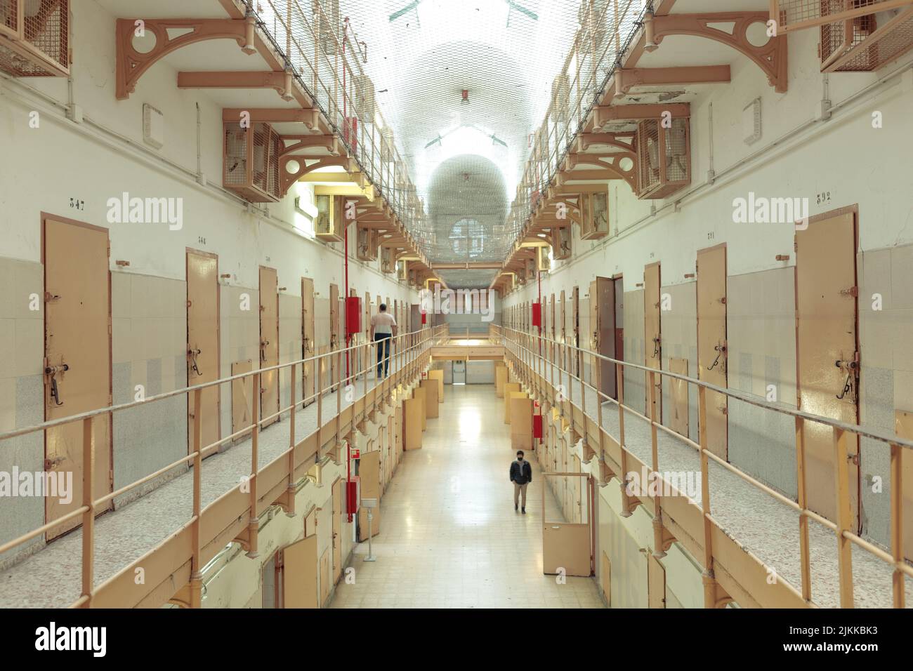 A beautiful shot of a big hall looks like a jail with a big number of ...