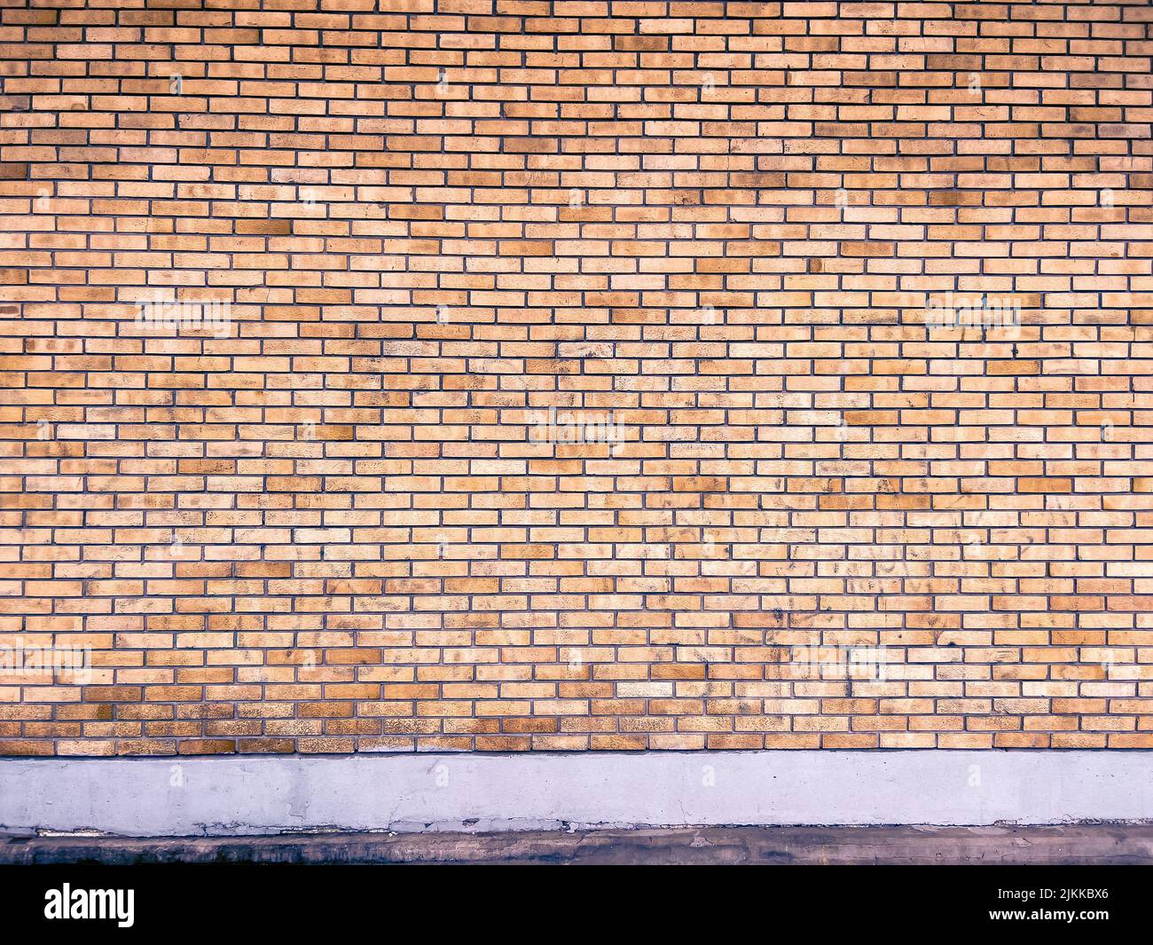 A frontal shot of an exterior brick wall pattern Stock Photo - Alamy