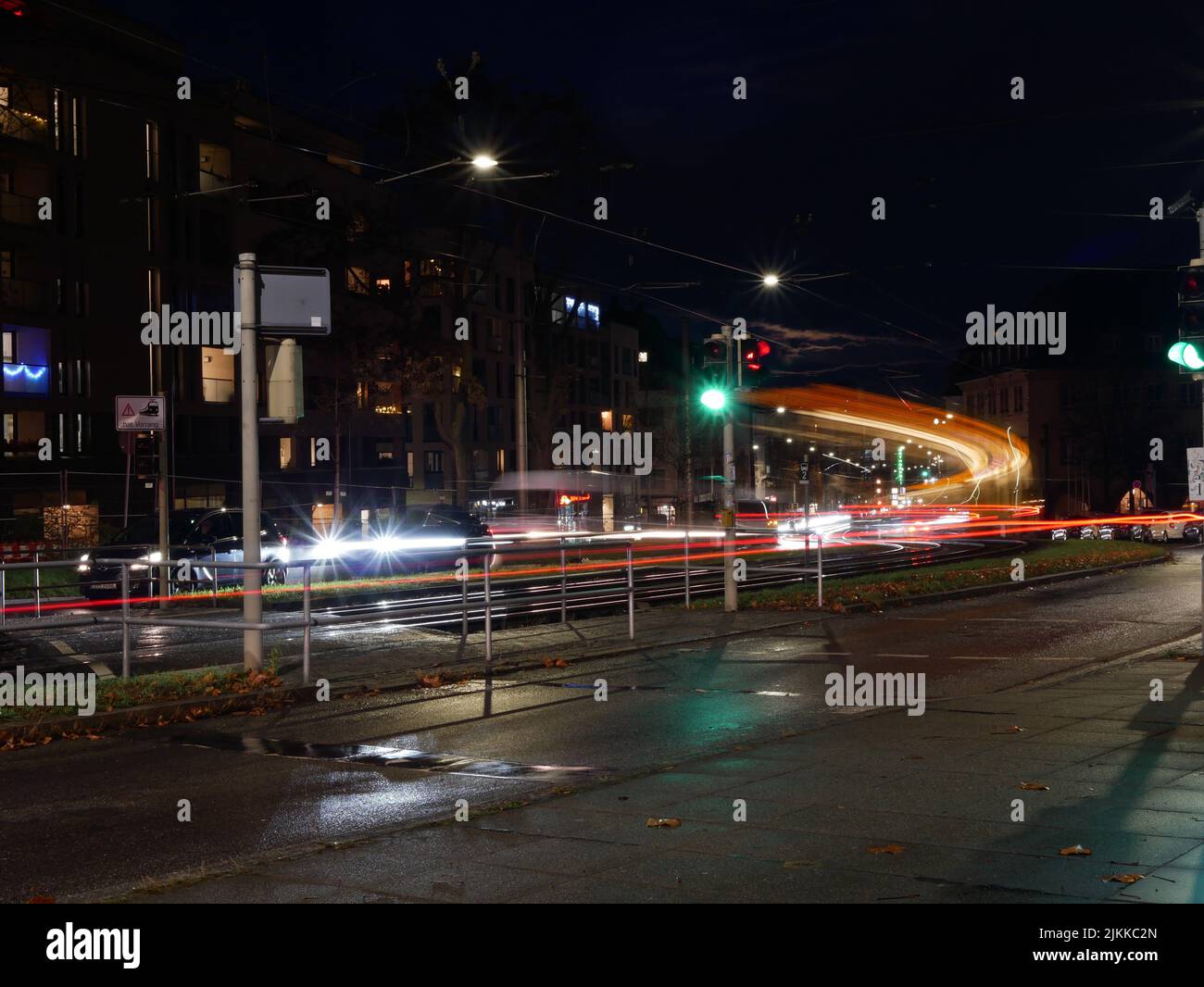 A long exposure shot of the street, buildings and lights of the city at ...