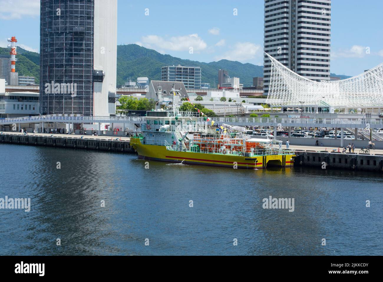 Ship in harbour along board walk in Kobe Japan Stock Photo - Alamy