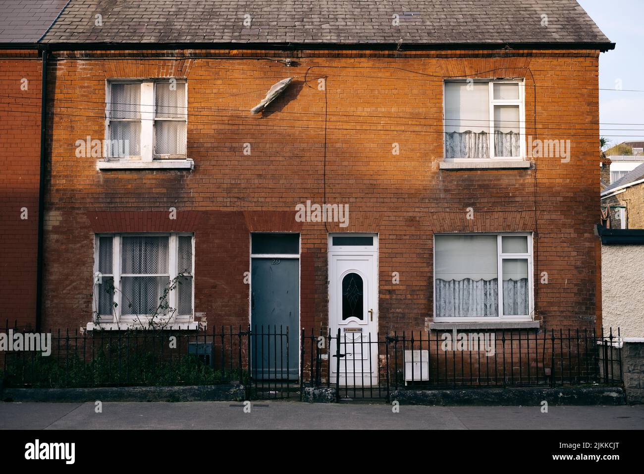 A front facade of brick houses in Dublin, Ireland Stock Photo - Alamy
