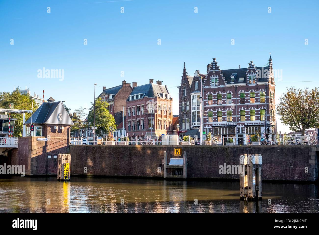 A scenic view of riverside buildings on the Nieuwe Maas river in ...