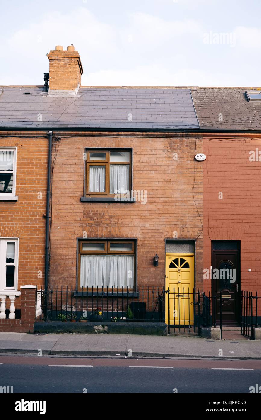 A front facade of brick houses in Dublin, Ireland Stock Photo - Alamy