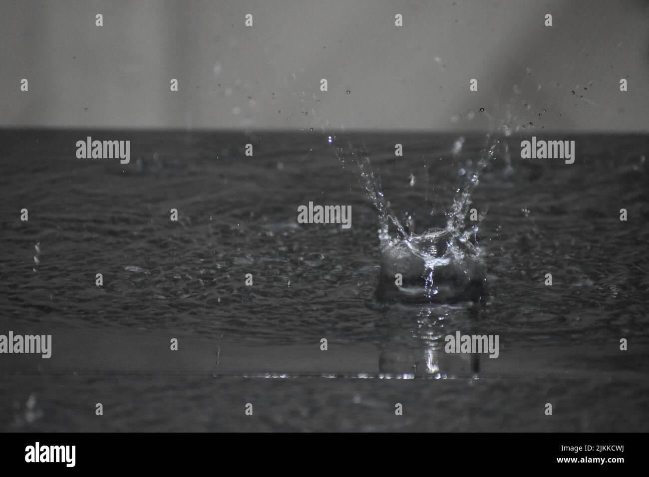a close up shot of Capturing heavy rain in low light Stock Photo - Alamy