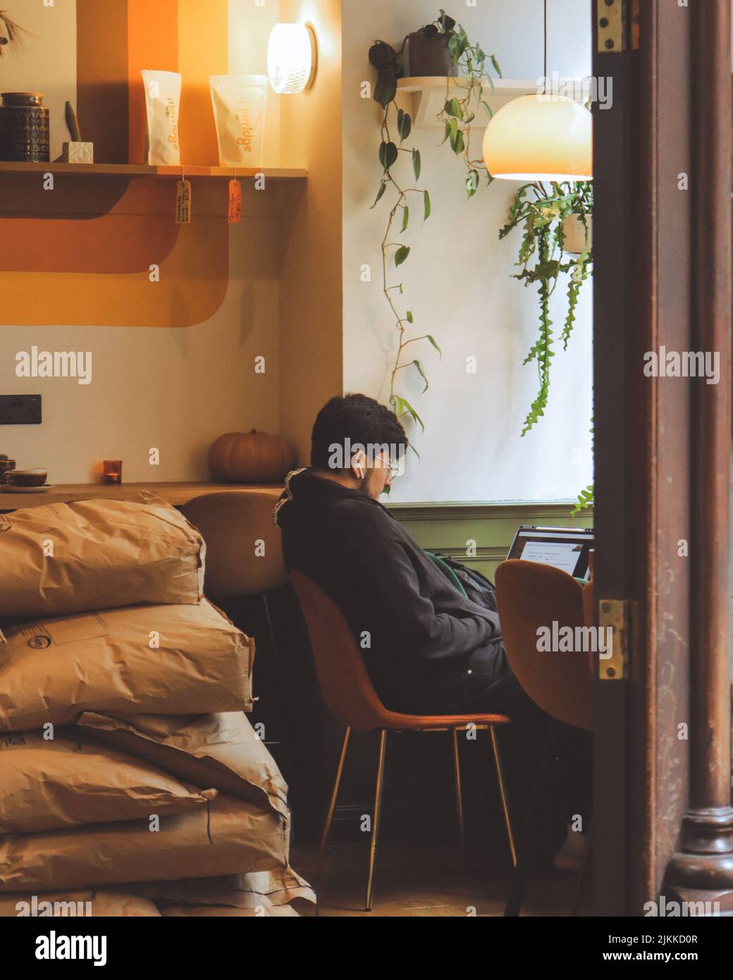 A closeup of a Man in a Coffee Shop Stock Photo - Alamy