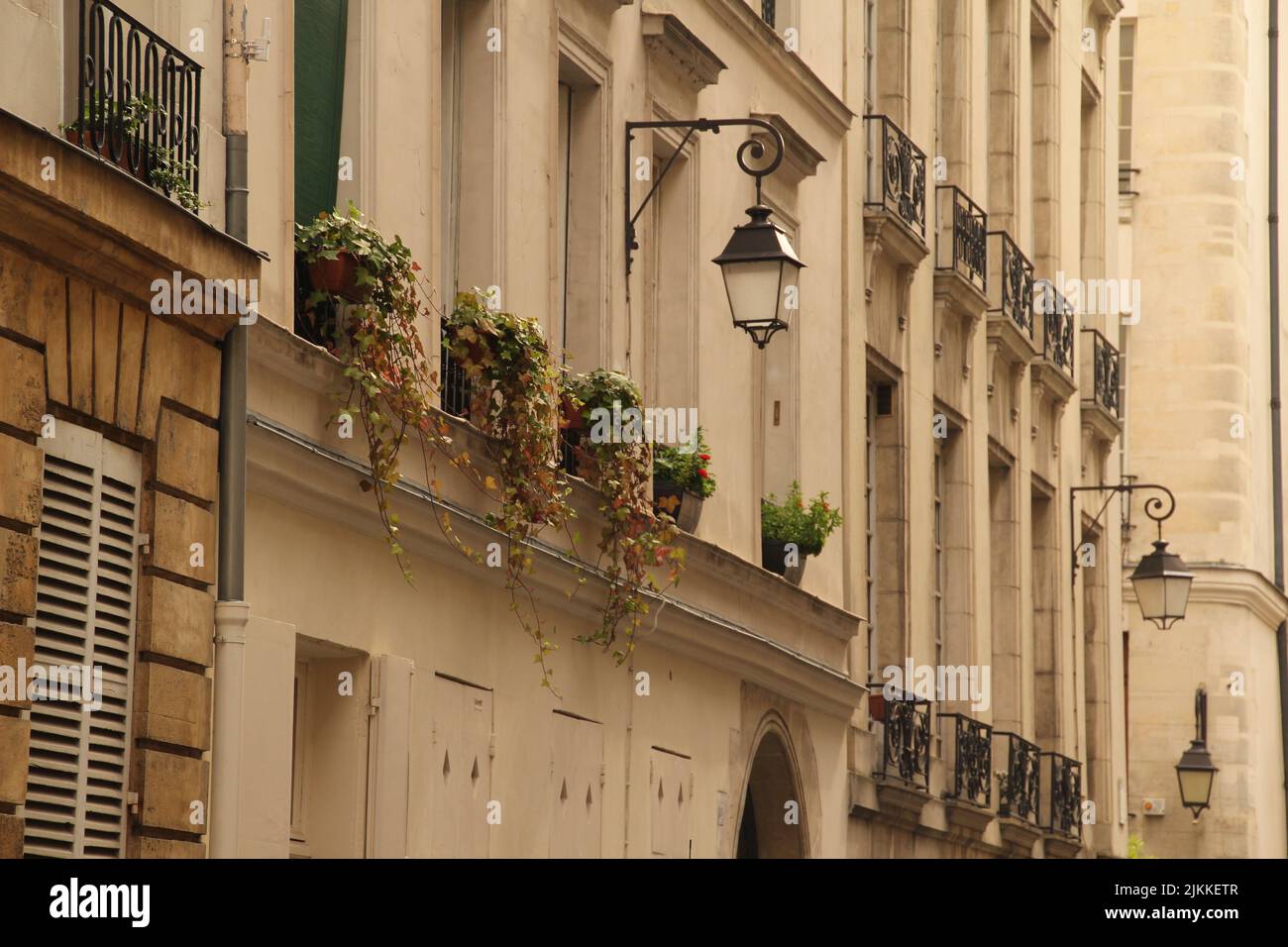 The exterior of an old building with light bulbs in Paris, France Stock ...